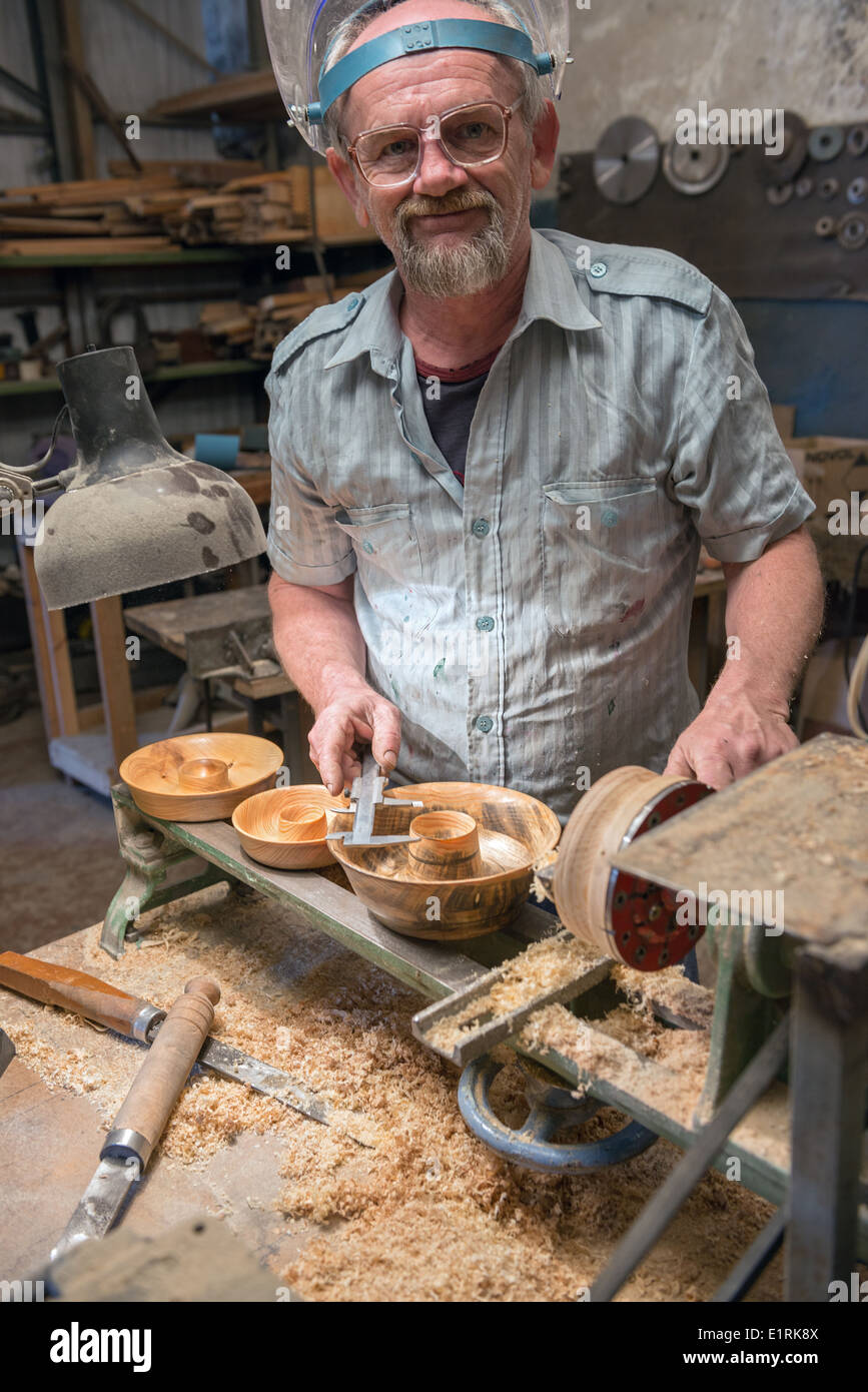 Man working on lathe hi-res stock photography and images - Alamy