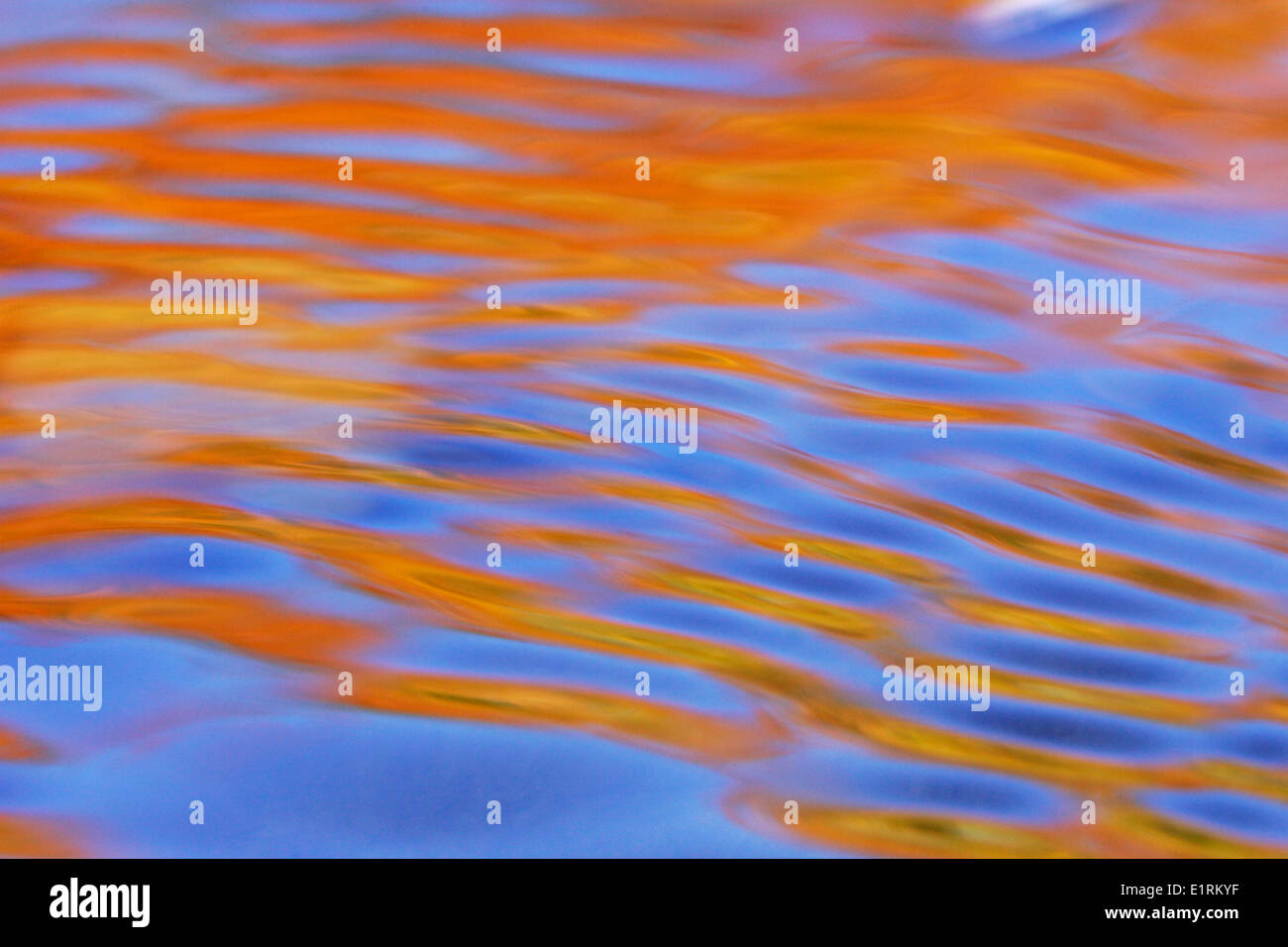 Colourful pattern in water reflection Stock Photo - Alamy