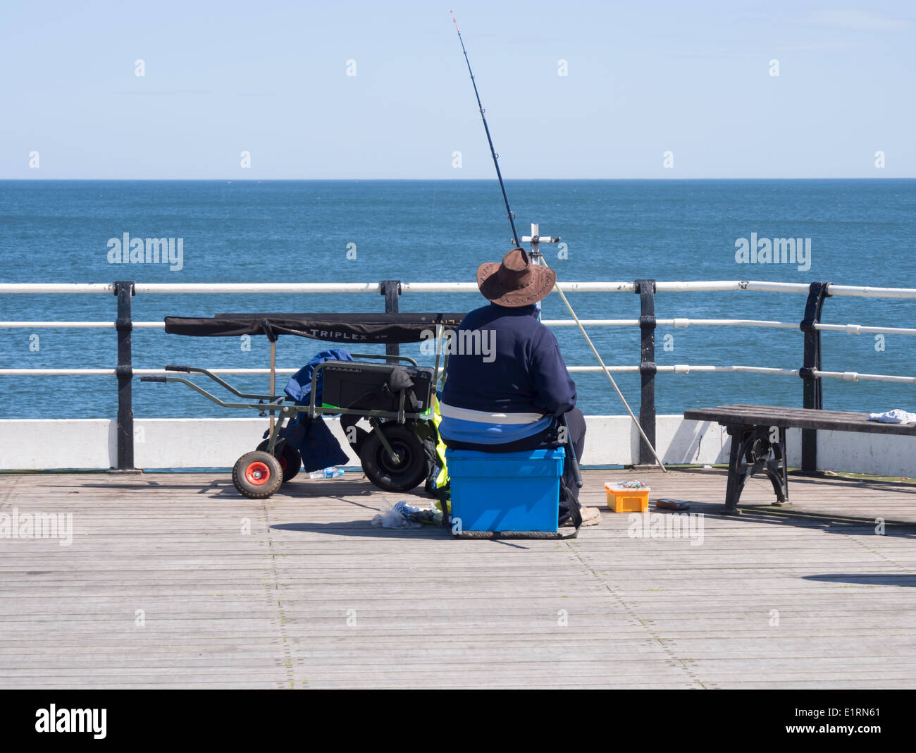 Angler fishing from end saltburn hi-res stock photography and images ...