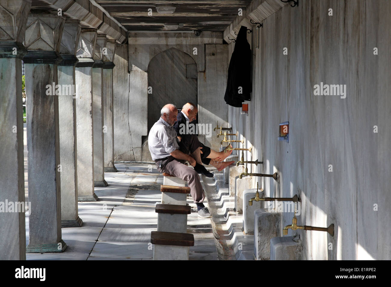 Washing before prayer hi-res stock photography and images - Alamy