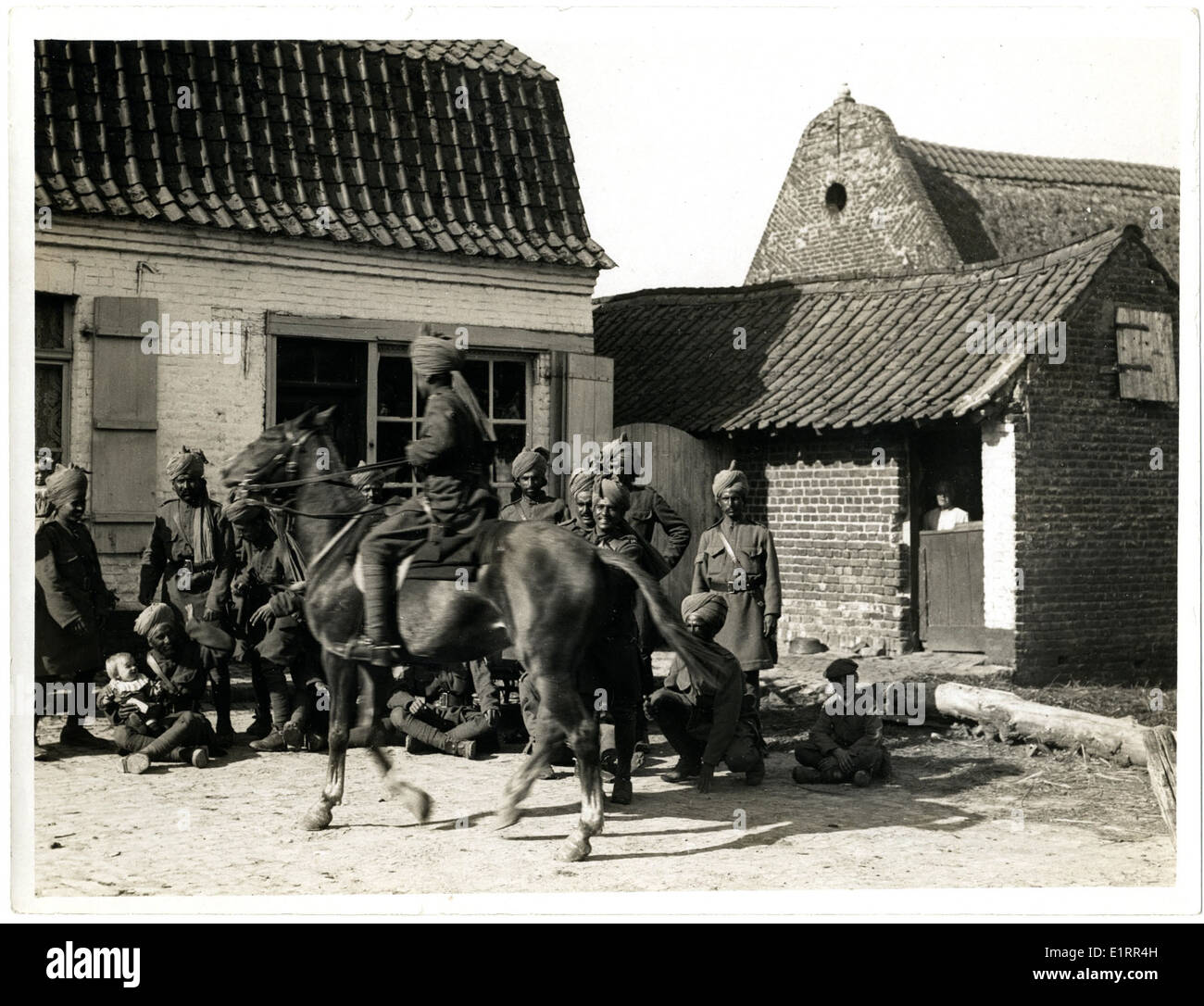 A trooper is seen arriving at a regimental post office with a bag of ...