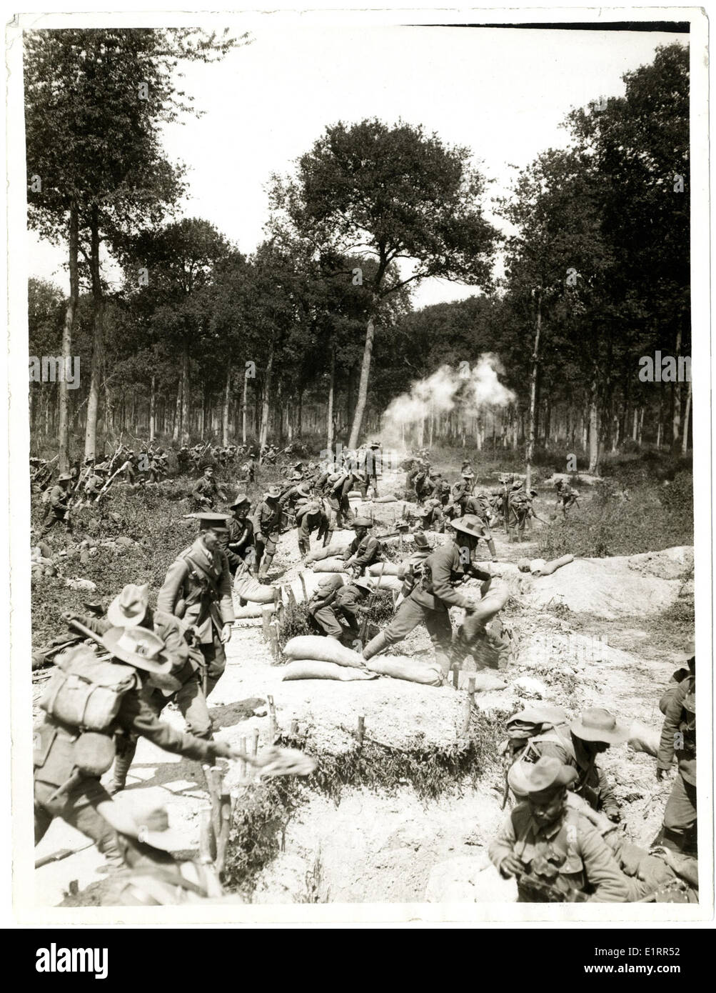 This photograph captures the second line of troops consolidating a ...