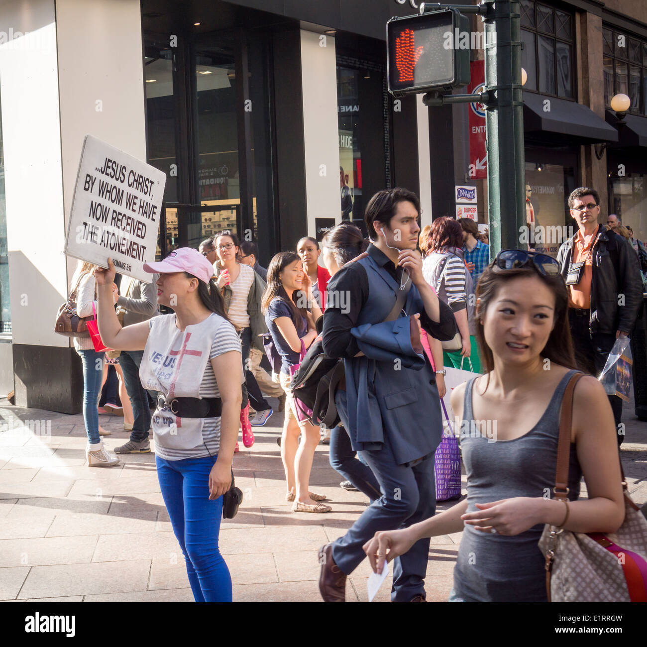 Members of the Blessed Hope Baptist Church pass out brochures as they ...