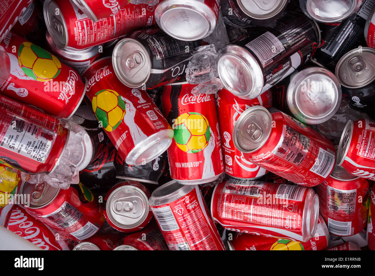 Cans of Coca-Cola branded for the FIFA World Cup and using art by ...