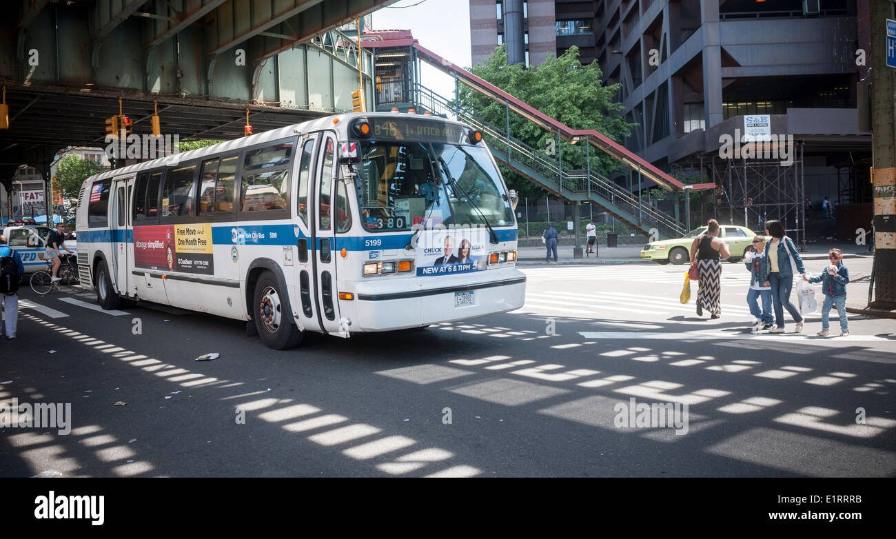 NYCTA bus on busy Flushing Avenue in the Bushwick neighborhood of ...