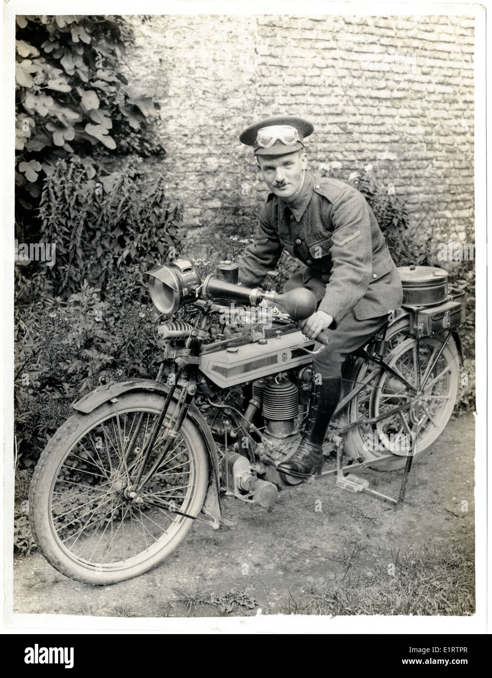 This photograph features a dispatch rider in France during World War I ...