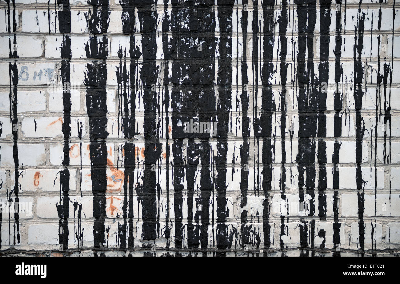 A white brick wall with streaks of bitumen as a background Stock Photo ...