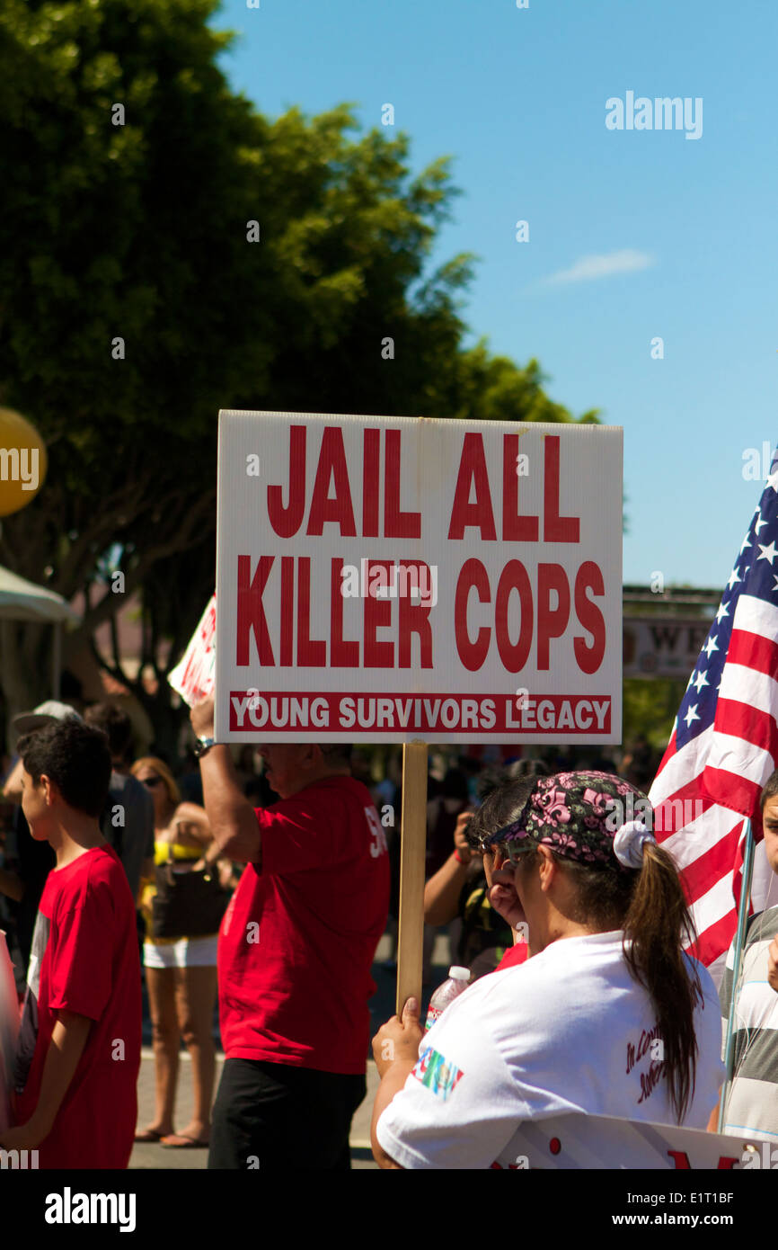Protesters with signs against police hi-res stock photography and ...
