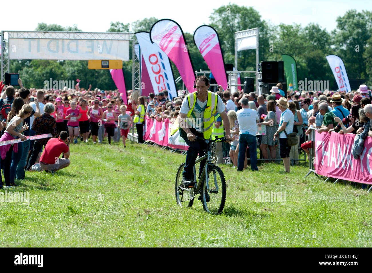 Race for Life, Cancer Research UK charity event, marshal at start ...