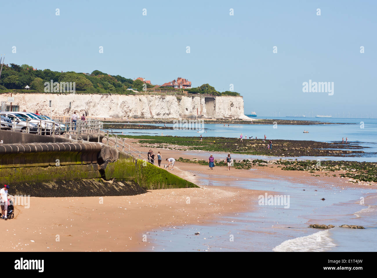 Beachcombers searching the rock pools at Broadstairs Stock Photo - Alamy