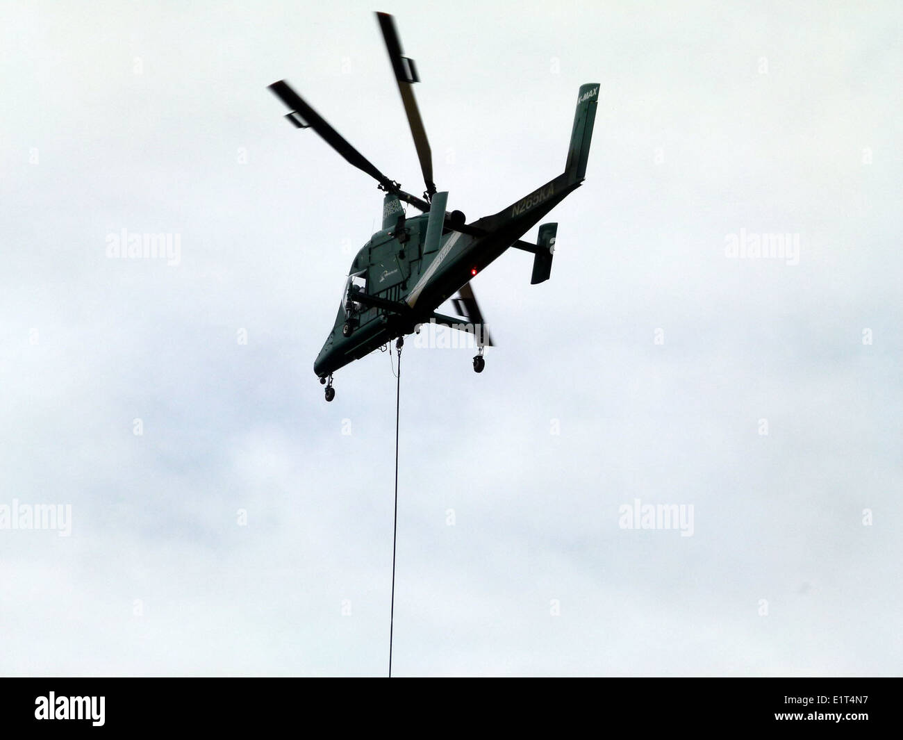 The KMAX helicopter was used to aerially distribute straw mulch over ...