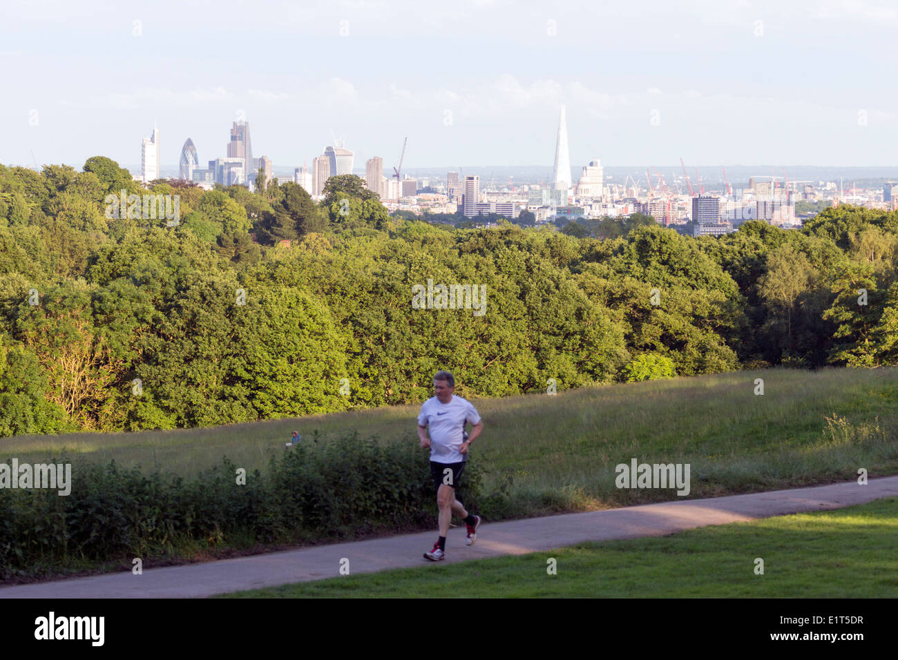 Man running london hi-res stock photography and images - Alamy