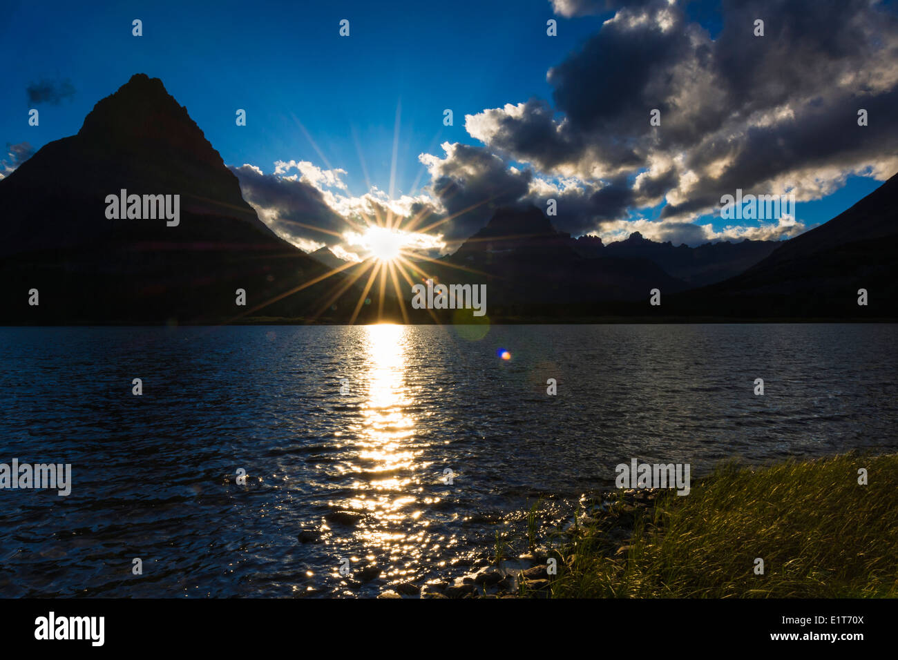 Grinnell Point and Swiftcurrent Lake at sunset, Many Glacier, Glacier ...
