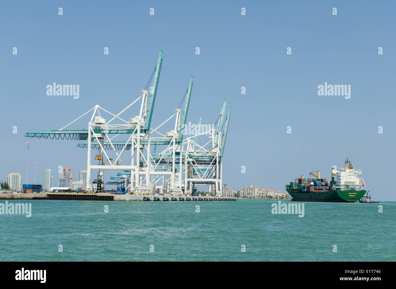 Cargo ship and containers at port area Stock Photo - Alamy