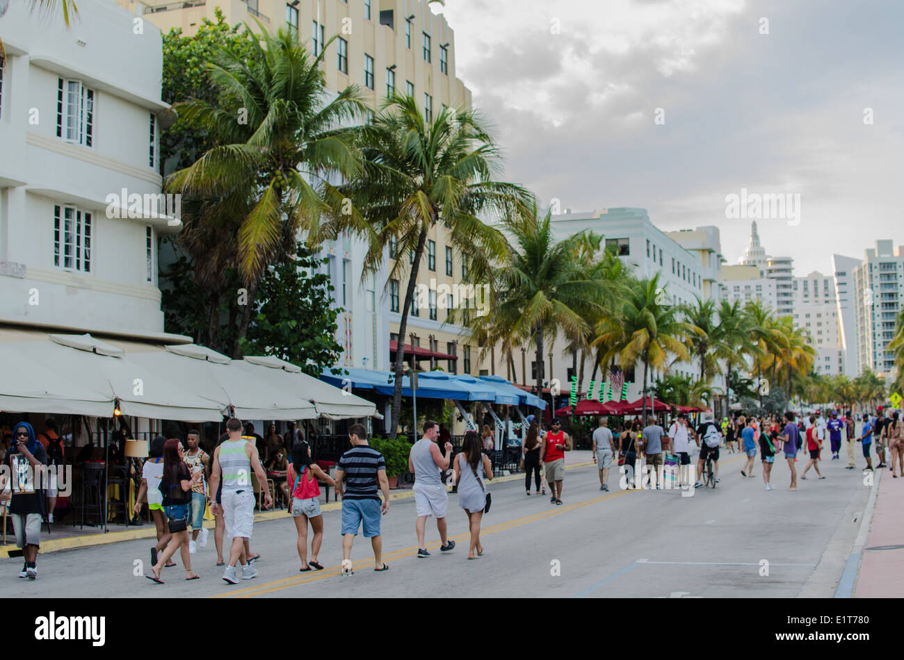 Tourists relaxing & enjoying on the street Stock Photo - Alamy