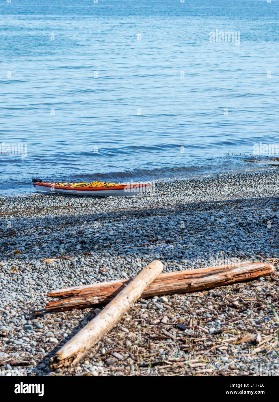 Kayak on a beach Stock Photo - Alamy
