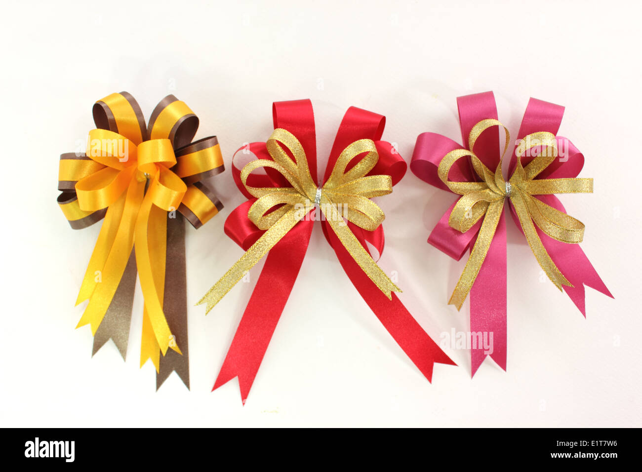 A ribbon bow present on white background Stock Photo - Alamy