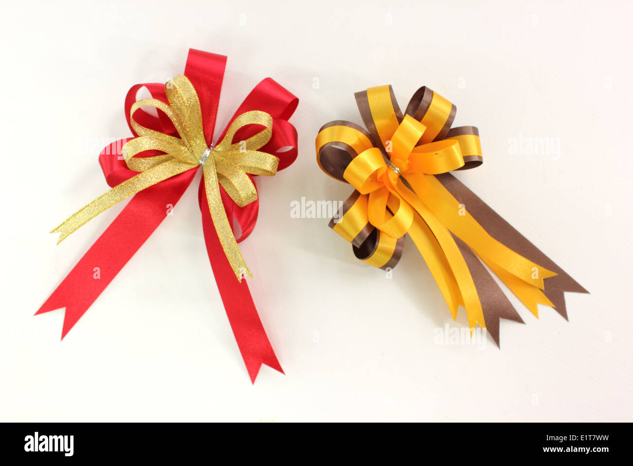A ribbon bow present on white background Stock Photo - Alamy
