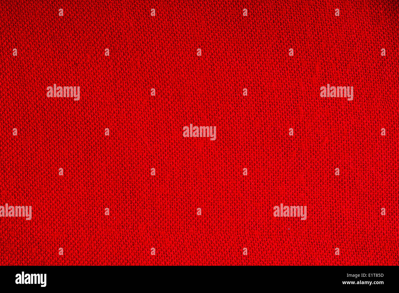 Closeup macro of red fabric textile material as texture pattern ...