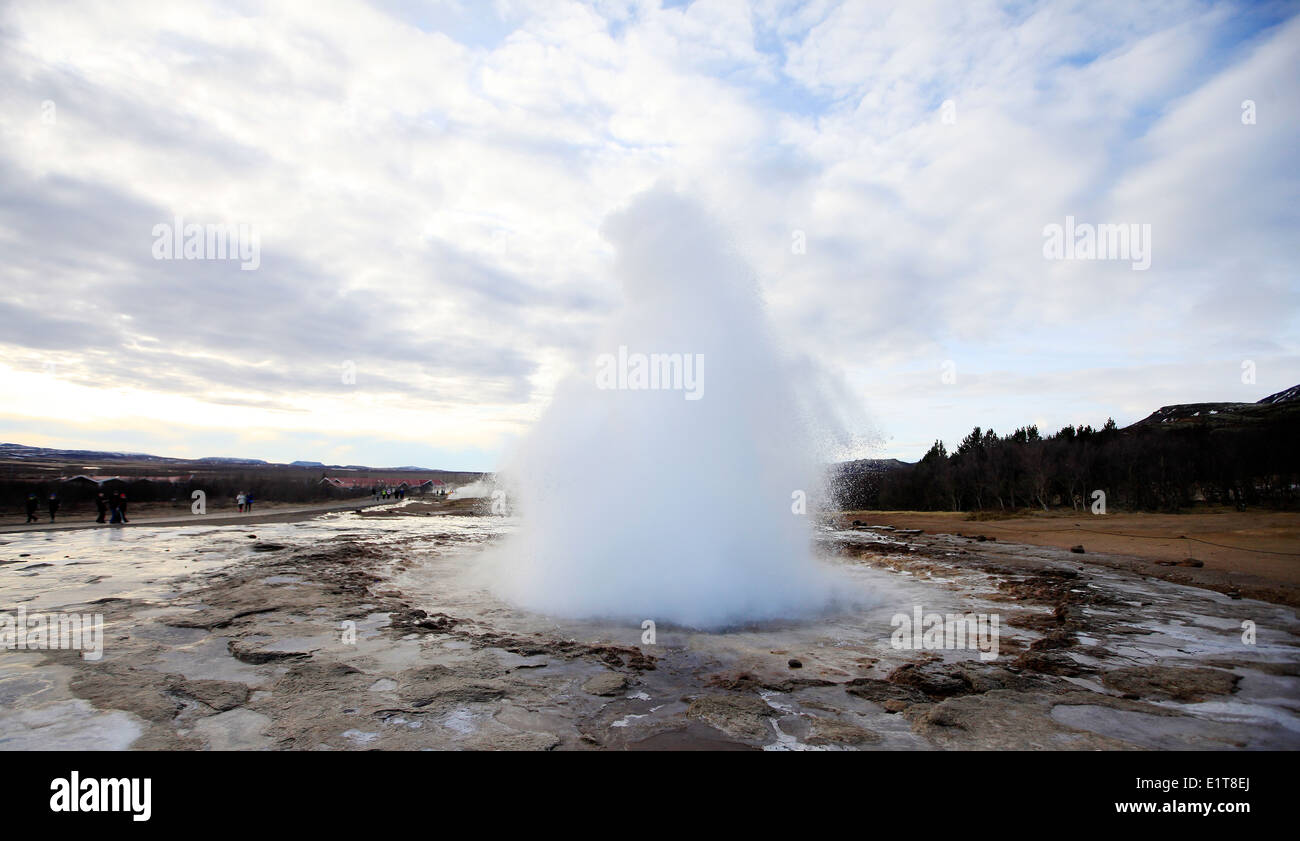 Strokkur geyser erupts at geothermally active valley of Haukadalur in ...