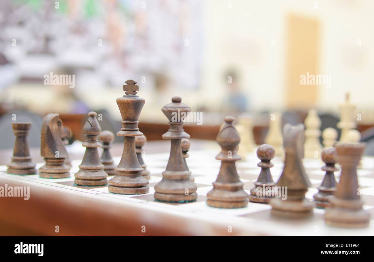 Wooden chess pieces on the table. Chess competition at school Stock ...