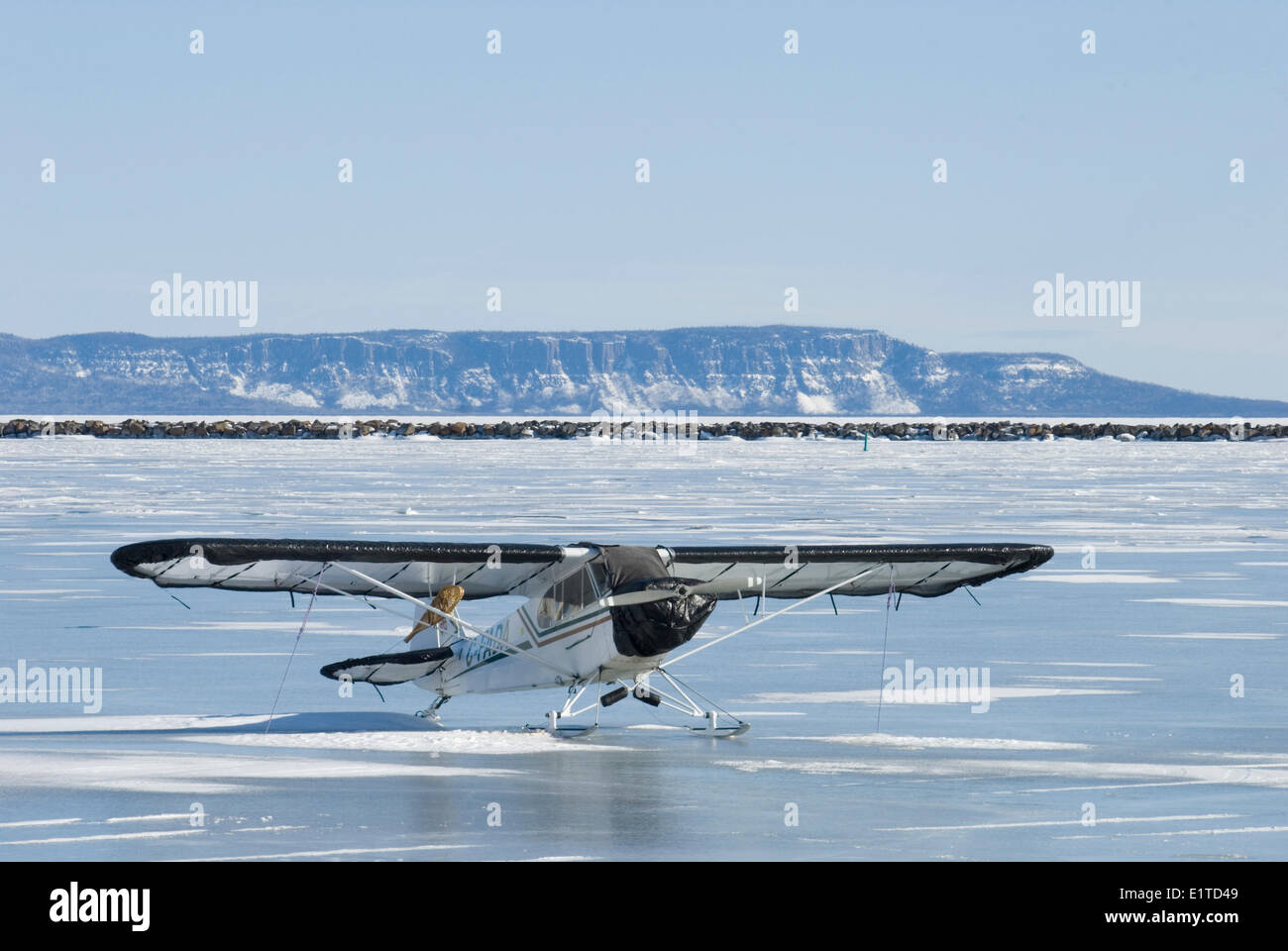 A plane parked on the lake Stock Photo - Alamy