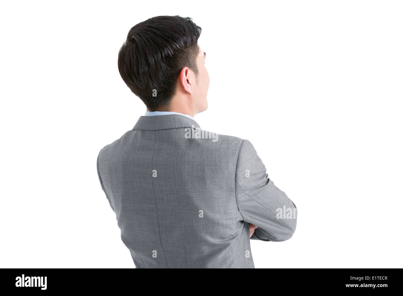 Rear view of Asian businessman, full length portrait isolated on white ...