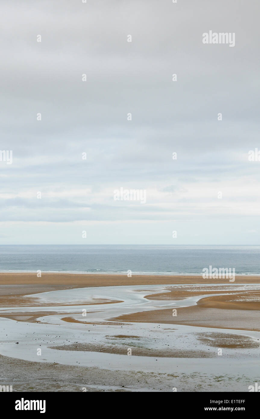 Coastal lagoon with a broad sandbeach enclosing a marshy area from the ...