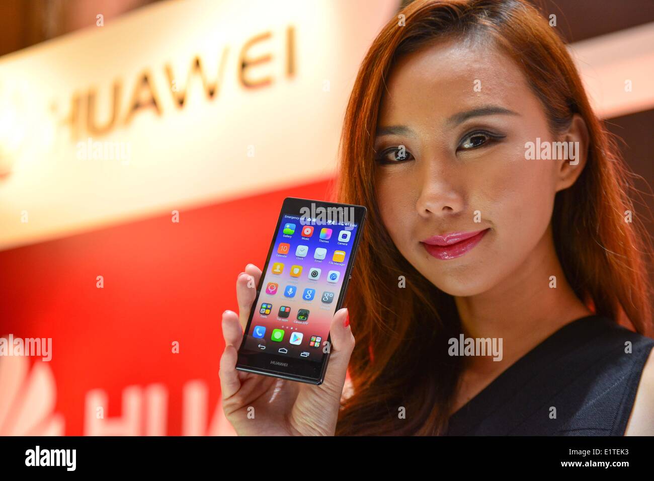 Kuala Lumpur, Malaysia. 10th June, 2014. A model displays Huawei smart ...