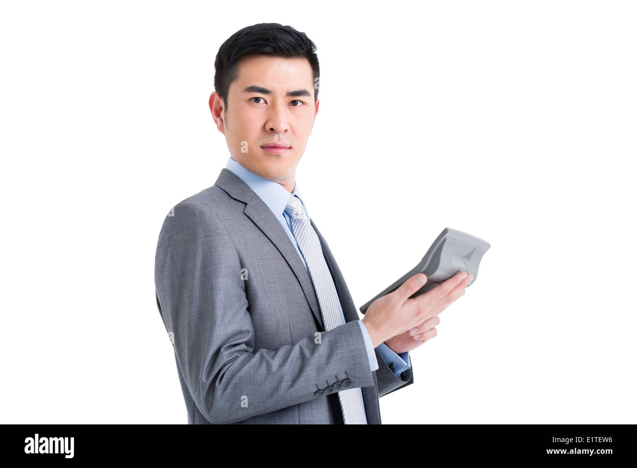 Young businessman in office calculator hi-res stock photography and ...
