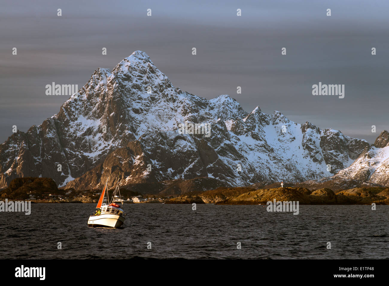 Boat sailing at sunset Lofoten Islands North Norway Scandinavia Stock ...
