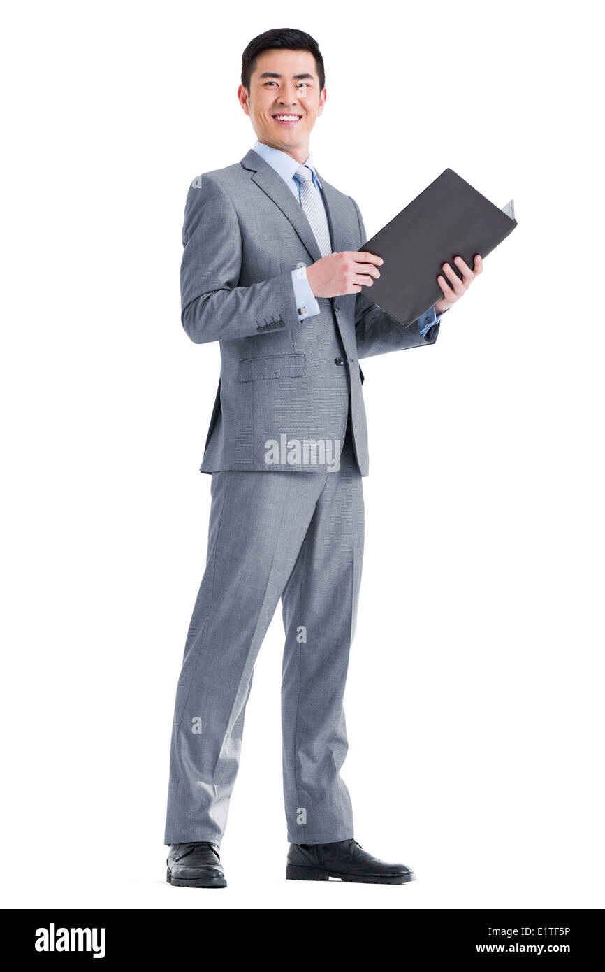 Businessman with file Stock Photo - Alamy