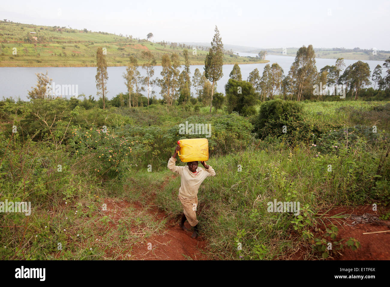 Children collect water in the Nyagatare district of Rwanda, east Africa ...