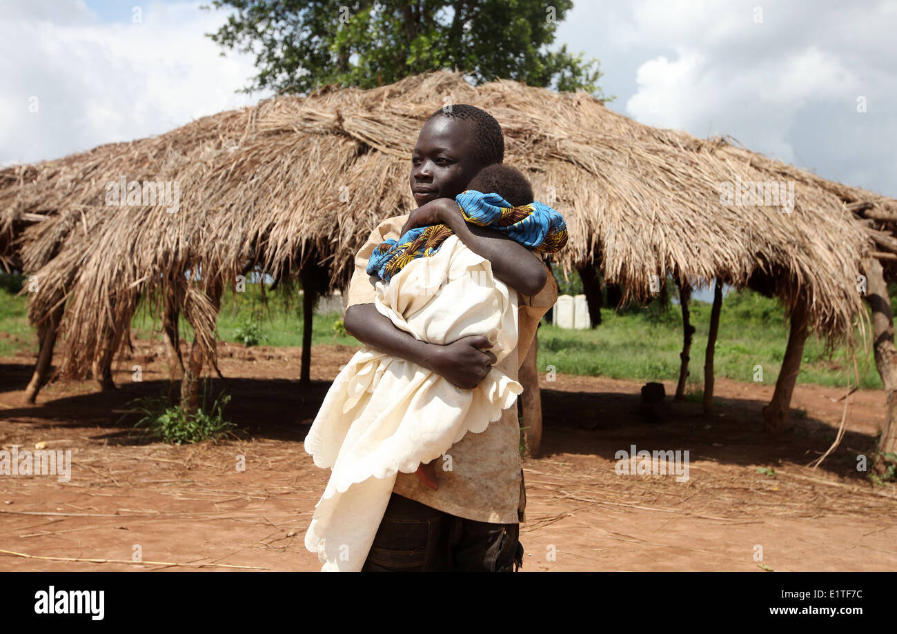 Two young children outside the village in the Lira district of northern ...