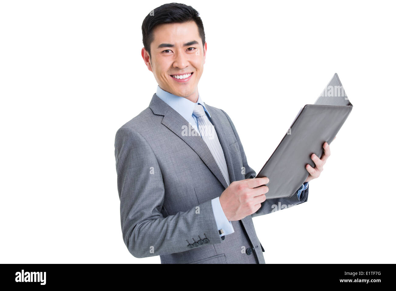 Businessman with file Stock Photo - Alamy