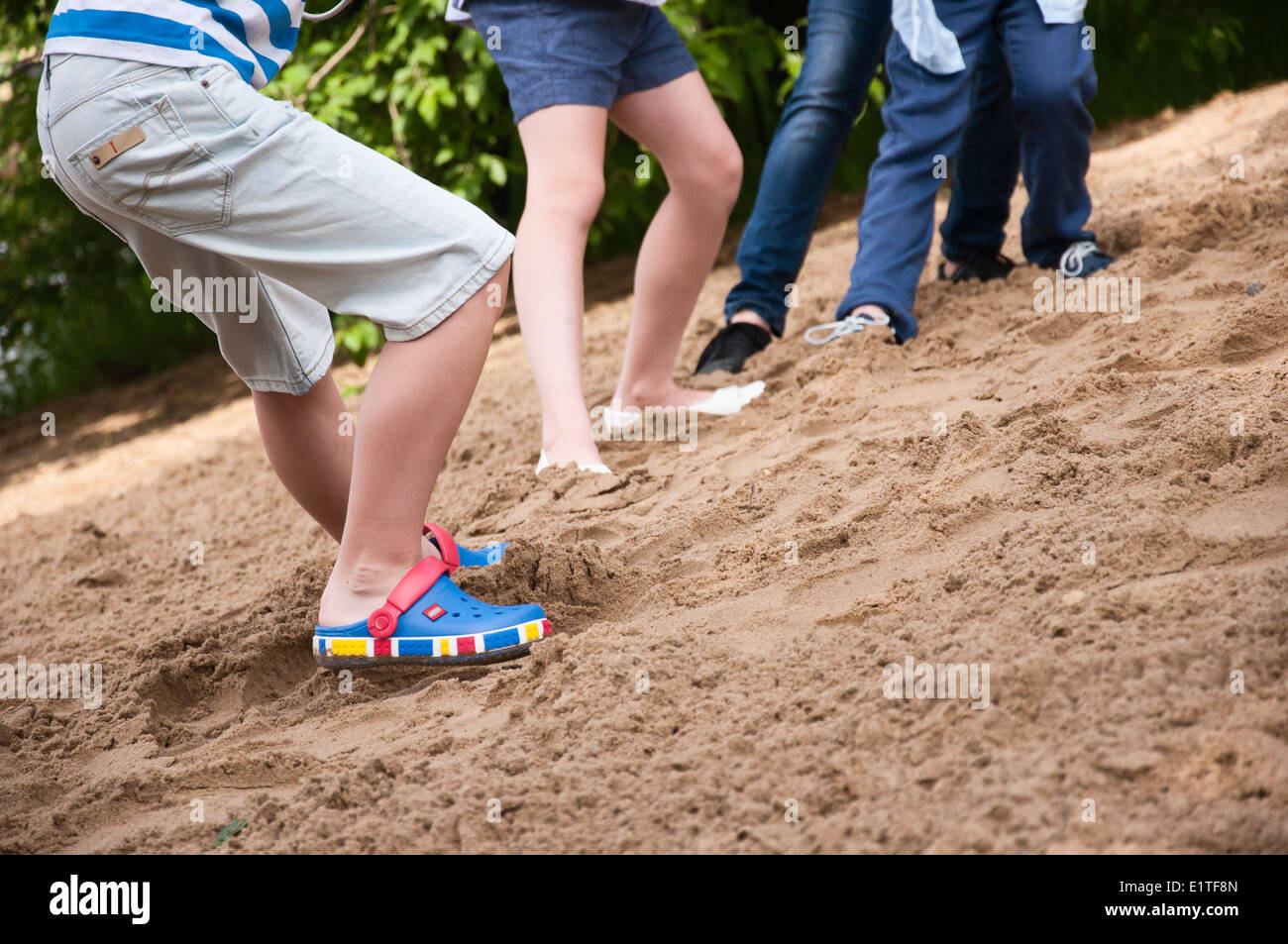 Children pulling rope hi-res stock photography and images - Alamy