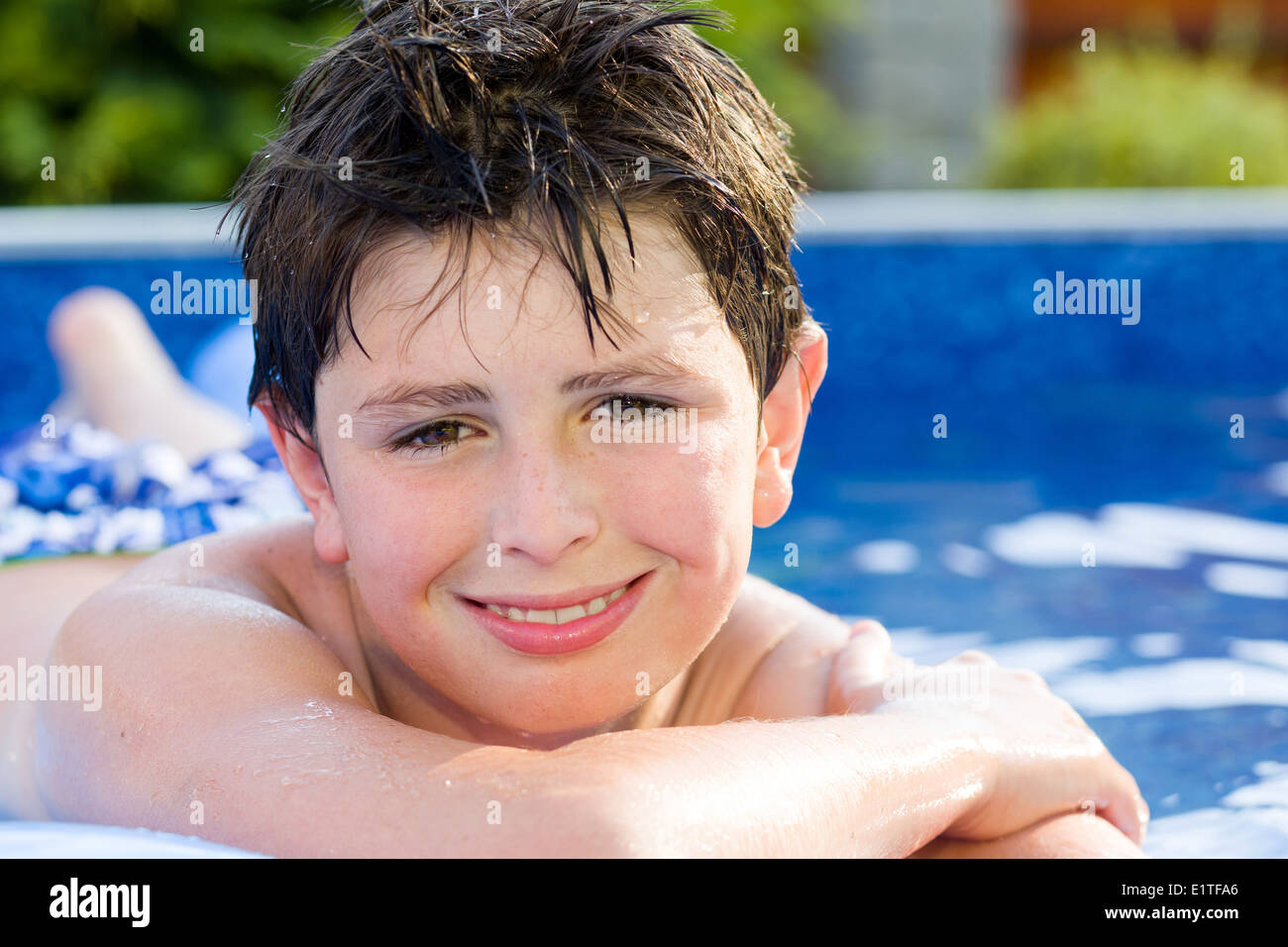 Boy with inflatable hi-res stock photography and images - Alamy