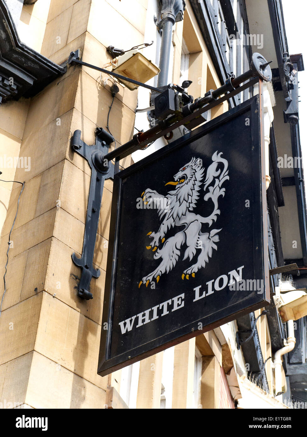 White Lion pub sign in Stockport Cheshire UK Stock Photo - Alamy