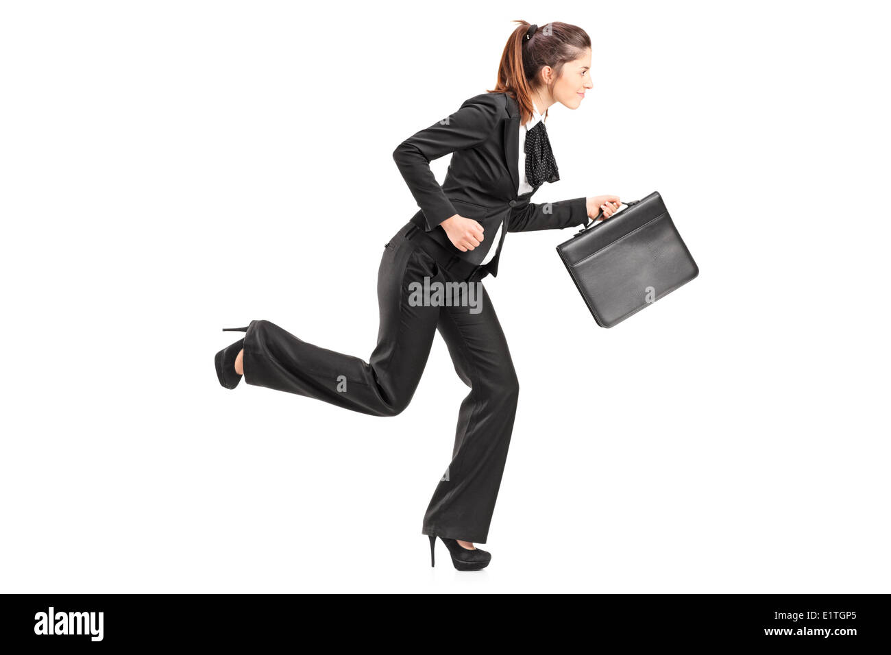 Female running with suitcase hi-res stock photography and images - Alamy
