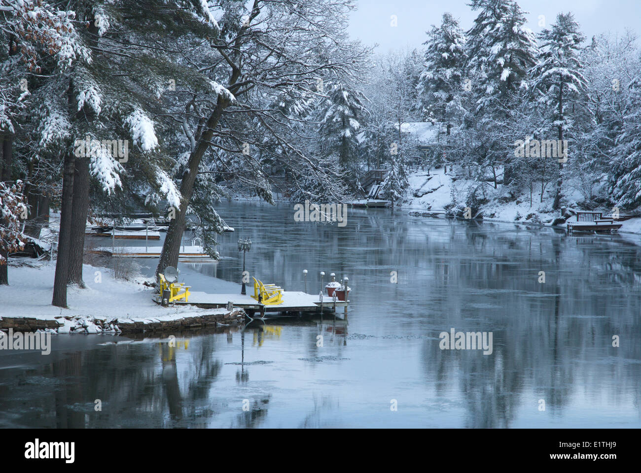 Yellow Muskoka Chairs and the Severn River in Muskoka Ontario Stock ...