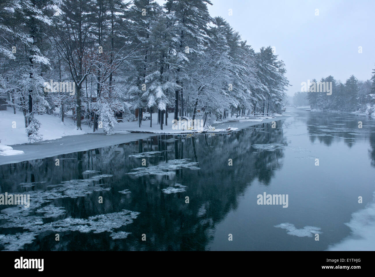 Early winter snow on the severn river in Cottage country, Muskoka ...
