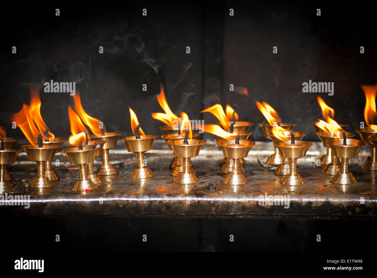 Butter Lamp offerings at Swayambhunath, Kathmandu, Nepal Stock Photo ...