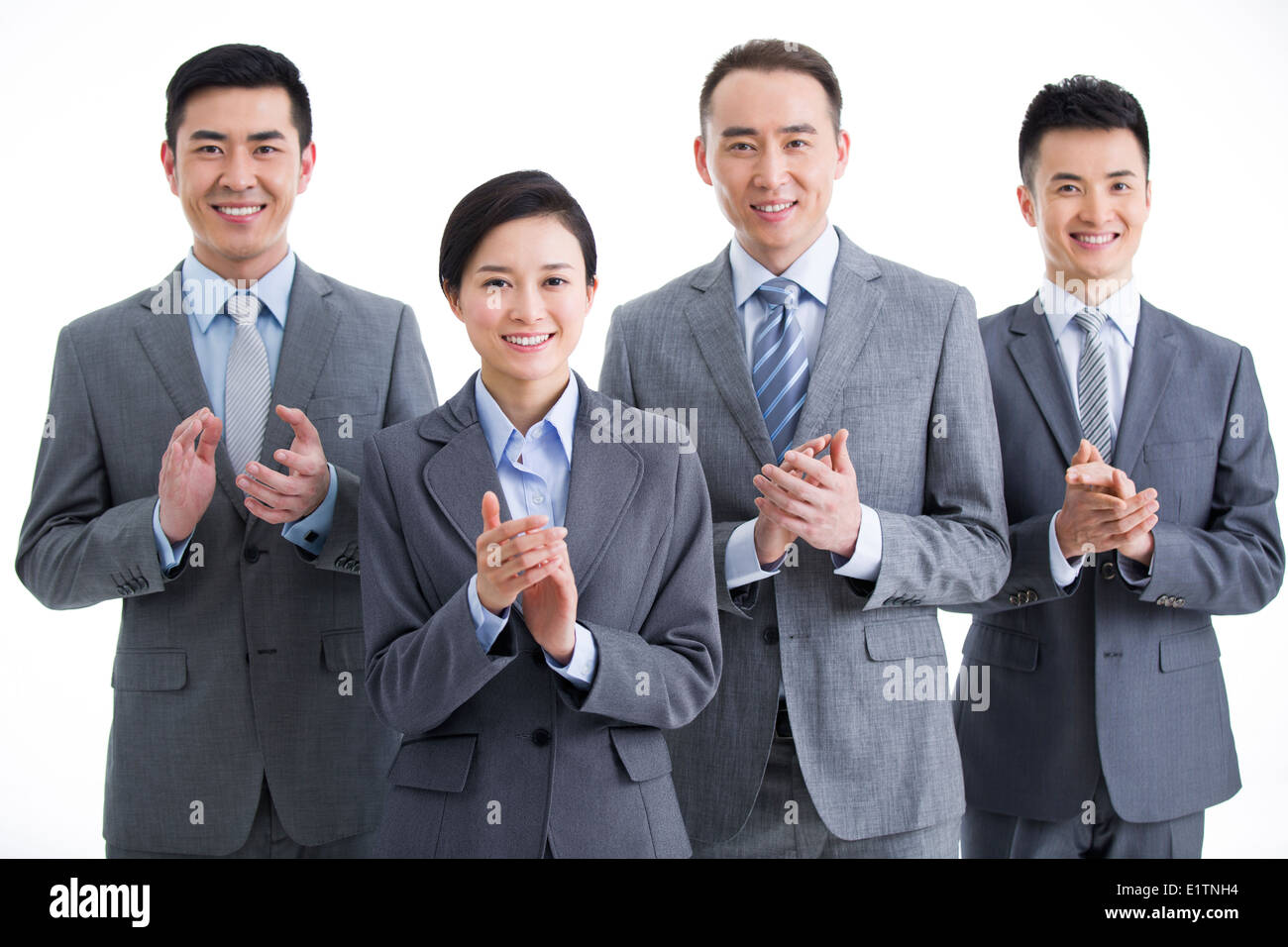 Cheerful business team clapping Stock Photo - Alamy