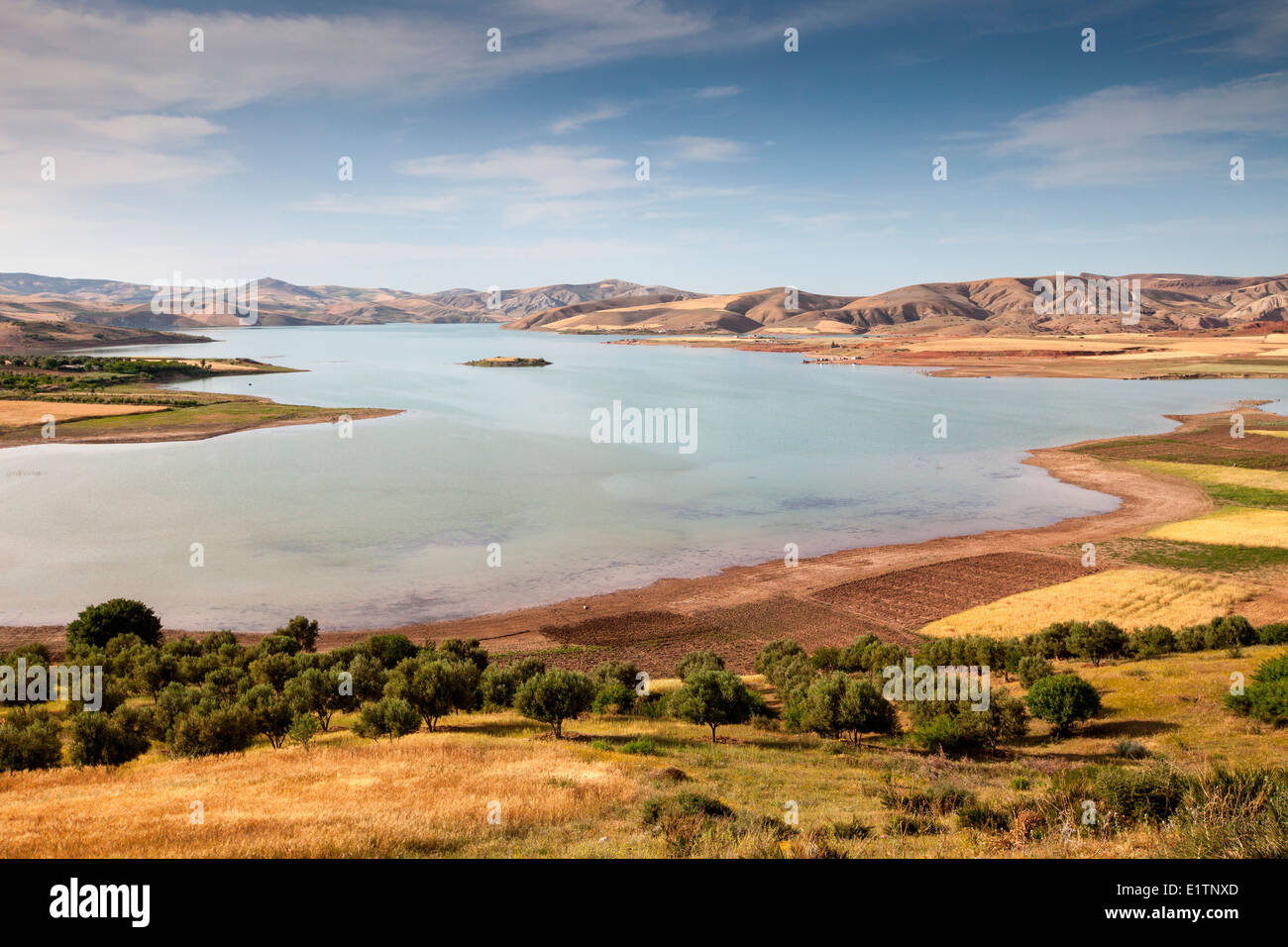 View of a man-made reservoir created by a dam providing hydroelectric ...