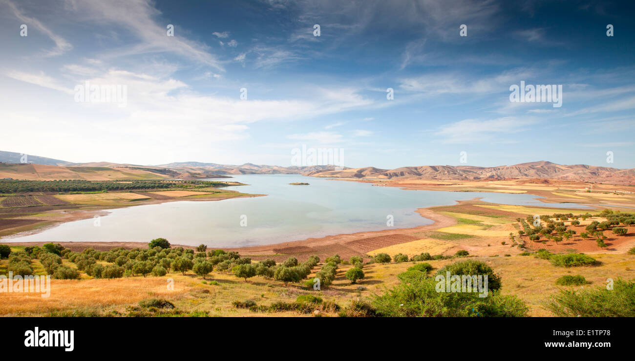 View of a man-made reservoir created by a dam providing hydroelectric ...