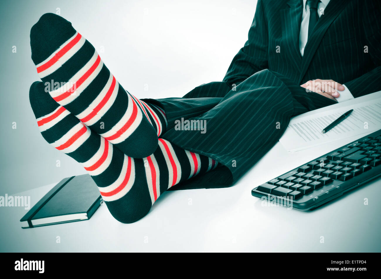 Feet on desk hi-res stock photography and images - Alamy