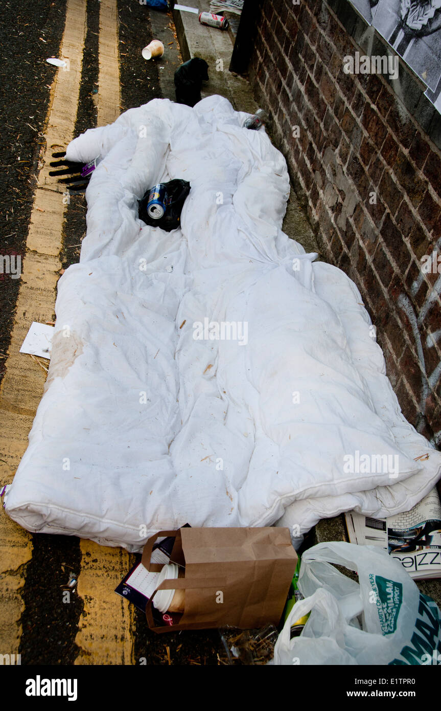 Buxton Street off Brick Lane, East London. June 8th 2014. Sleeping in ...