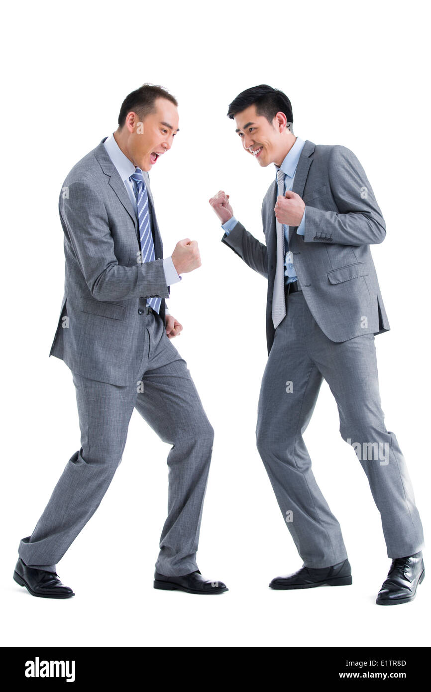 Businessmen punching the air Stock Photo - Alamy