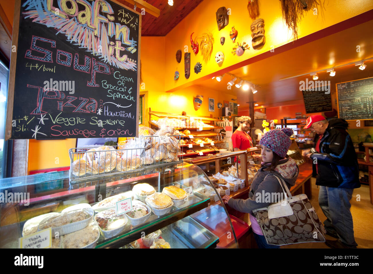 A young woman takes in the ecclectic mix of food at the Common Loaf ...