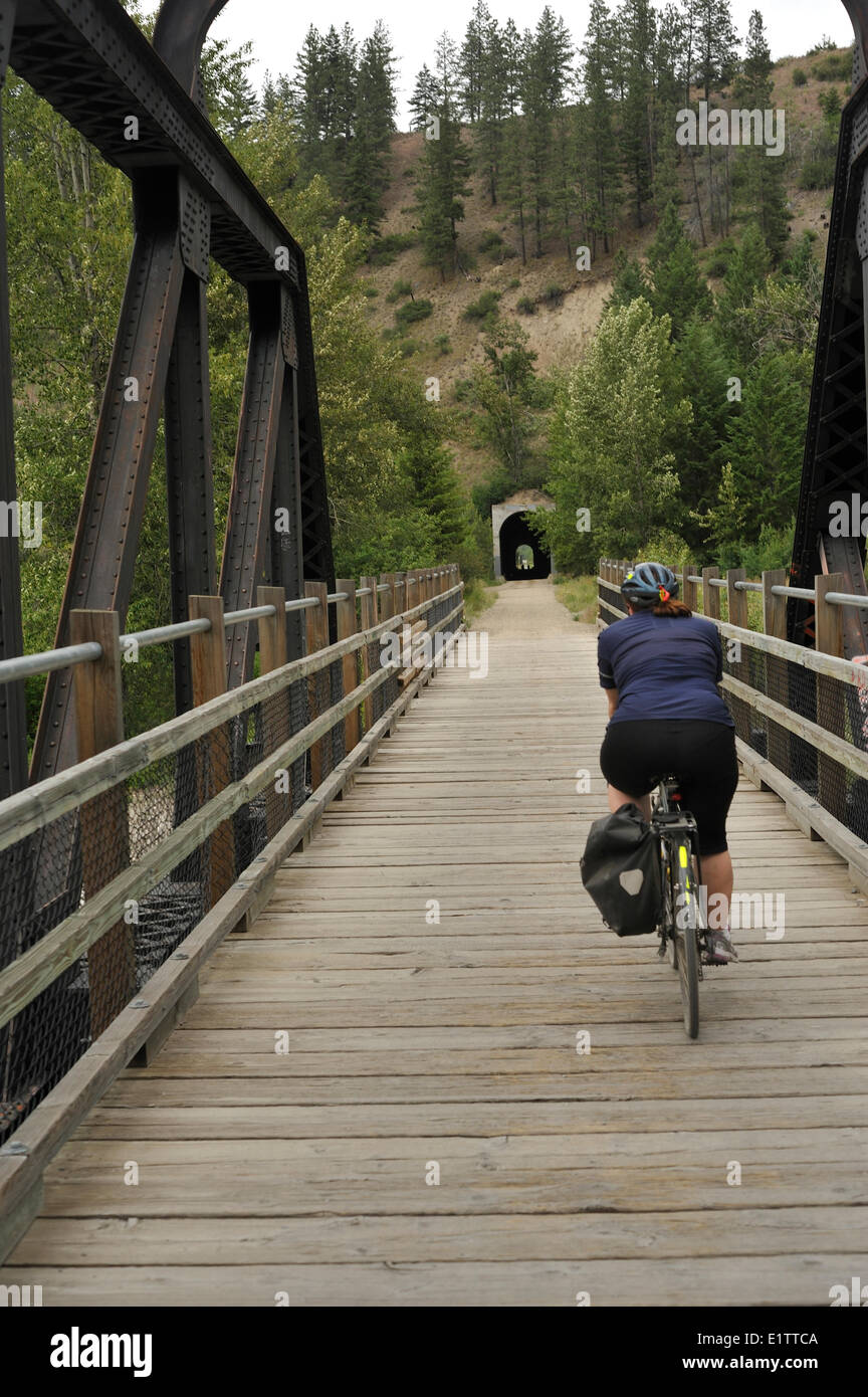 cyclist on Trans-Canada hiking biking trail (site former Kettle Valley ...
